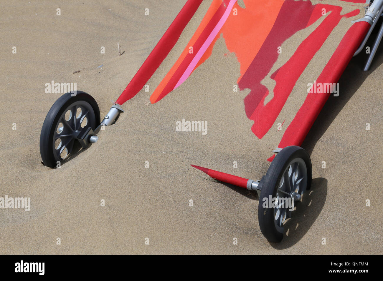 trolley for transporting the material on the beach is submerged by the ...