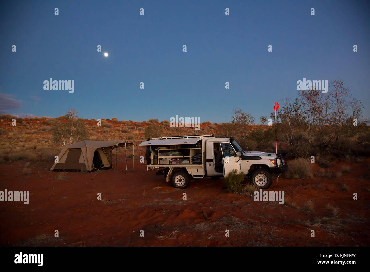Moon Setting over Camp in the Australian Outback Stock Photo - Alamy