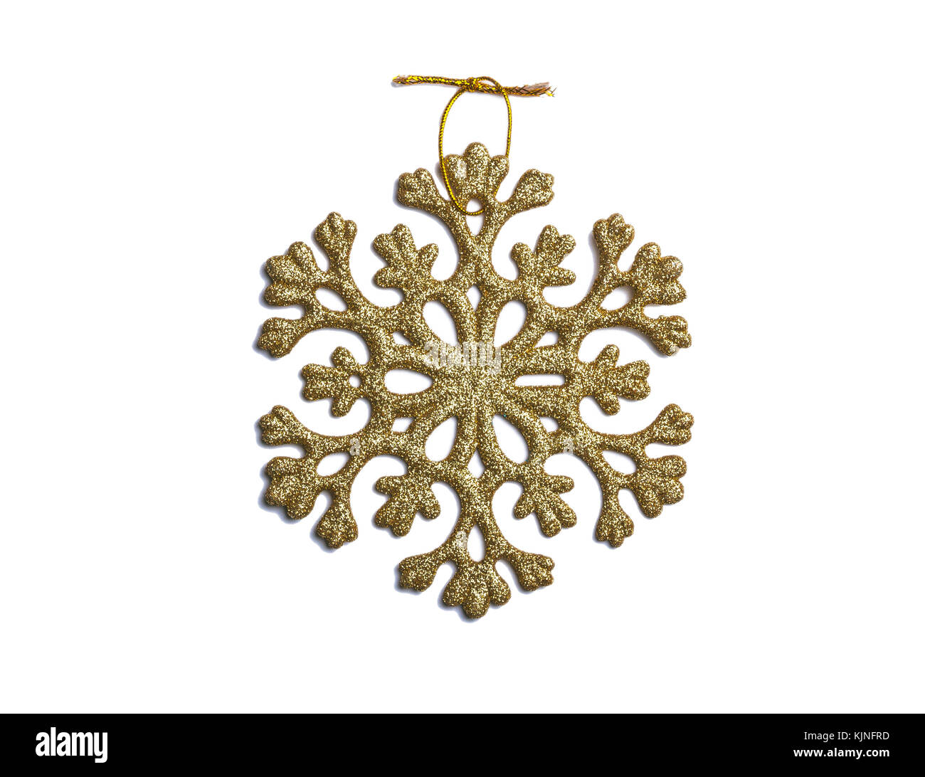 Golden Christmas snowflake isolated on white background Stock Photo - Alamy