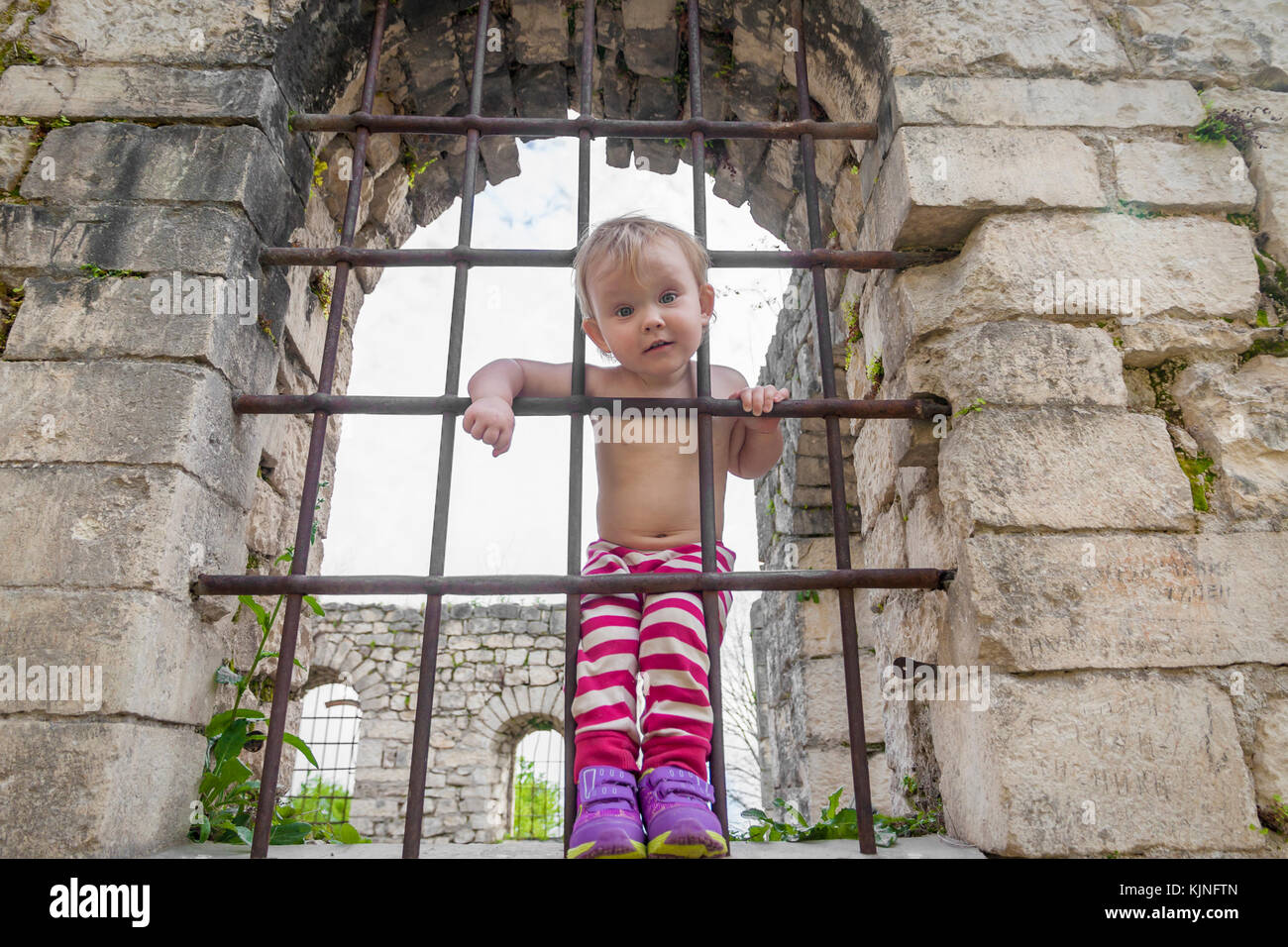 The girl child behind bars Stock Photo - Alamy The girl child behind bars Stock Photo - Alamy