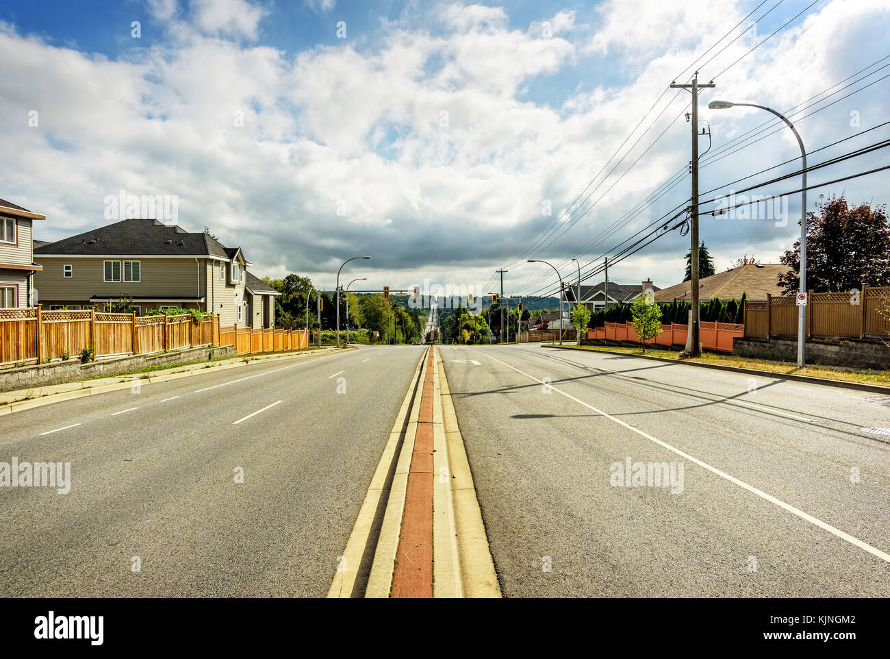beautiful asphalt road in the suburbs with beautiful scenery, blue sky ...