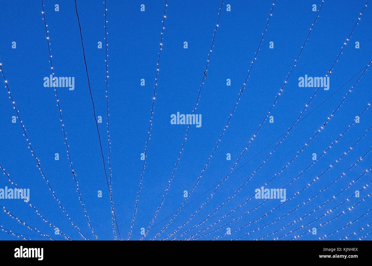 Light strings against dark blue sky for Christmas, New Year or other ...