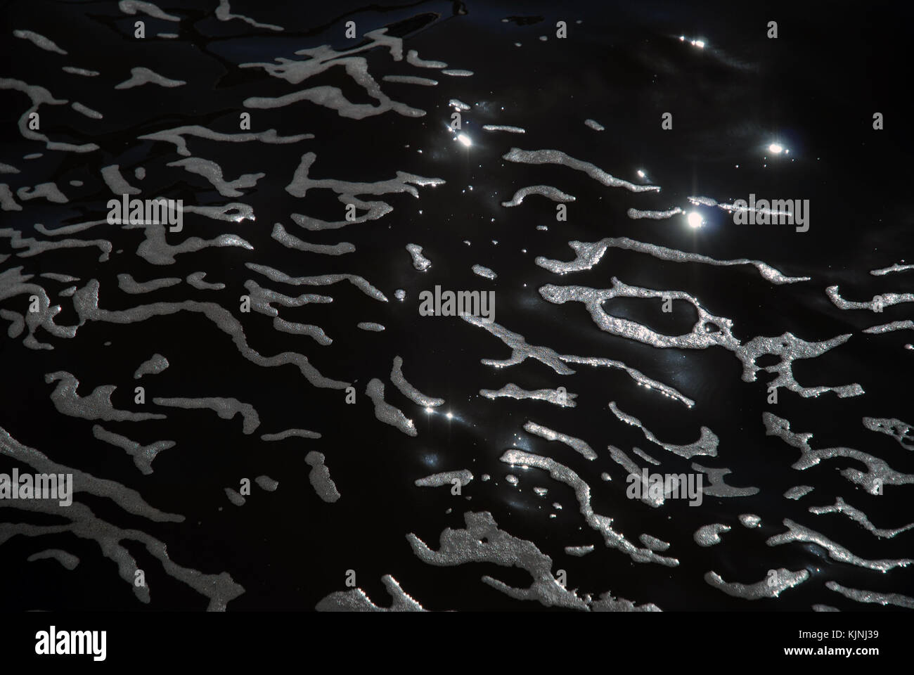 Abstract reflections of water ripples and bubbles, swan river, Perth ...