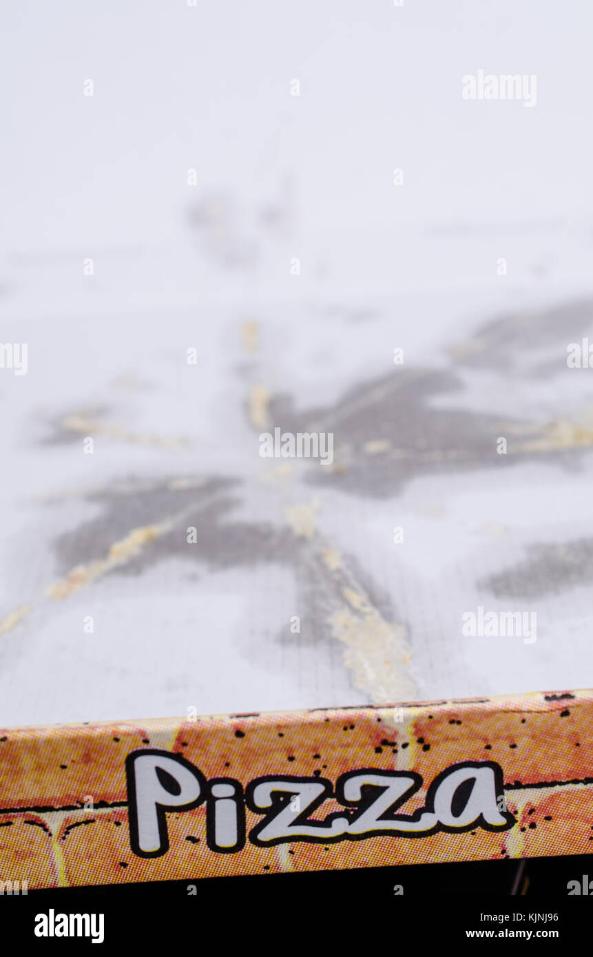 Empty pizza box with grease stains, a fast food concept Stock Photo - Alamy