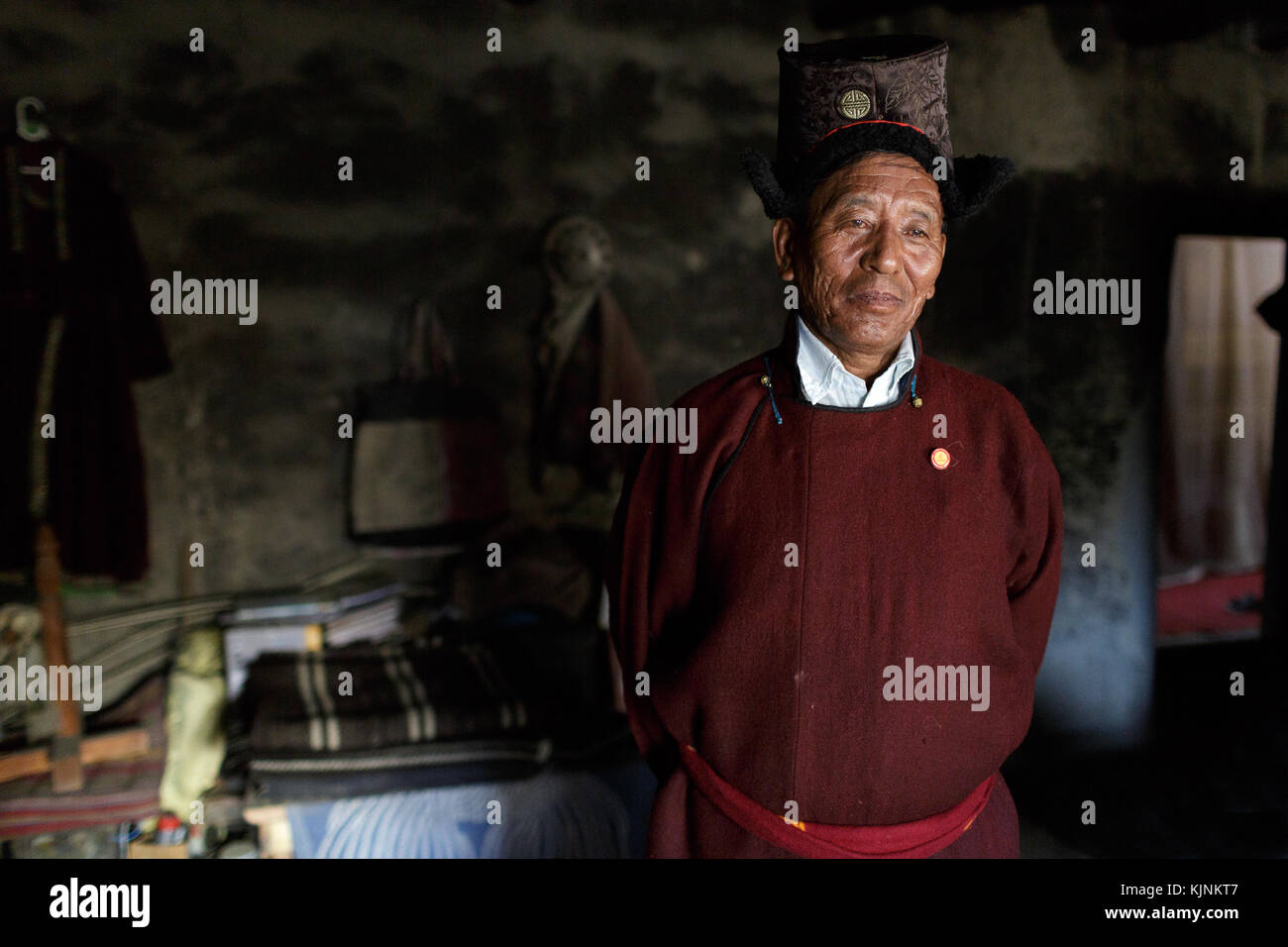 Ladakhi man in traditional clothes inside his house, Leh, Ladakh, Jammu ...