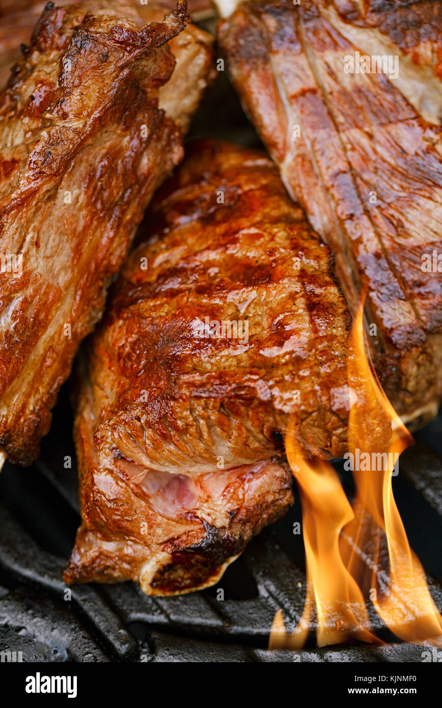beef short ribs on bbq flame grill Stock Photo - Alamy