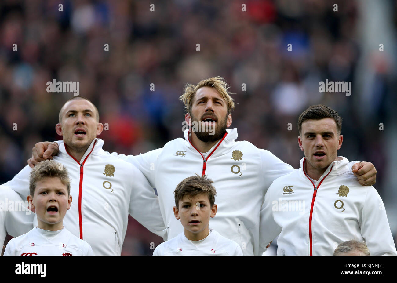 England's Mike Brown (L - R) Chris Robshaw and George Ford sing the ...