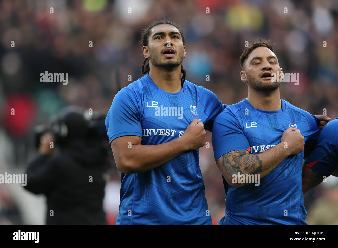 Samoa captain Chris Vui (left) sings his national anthem before the ...