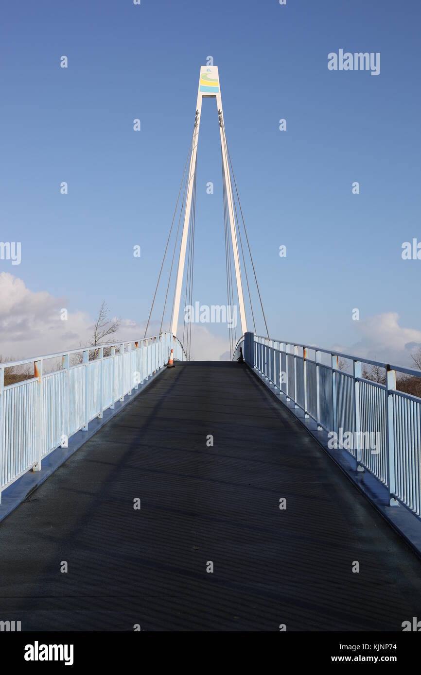 A bridge over the A484 on the Millennium Coastal Path, on National ...