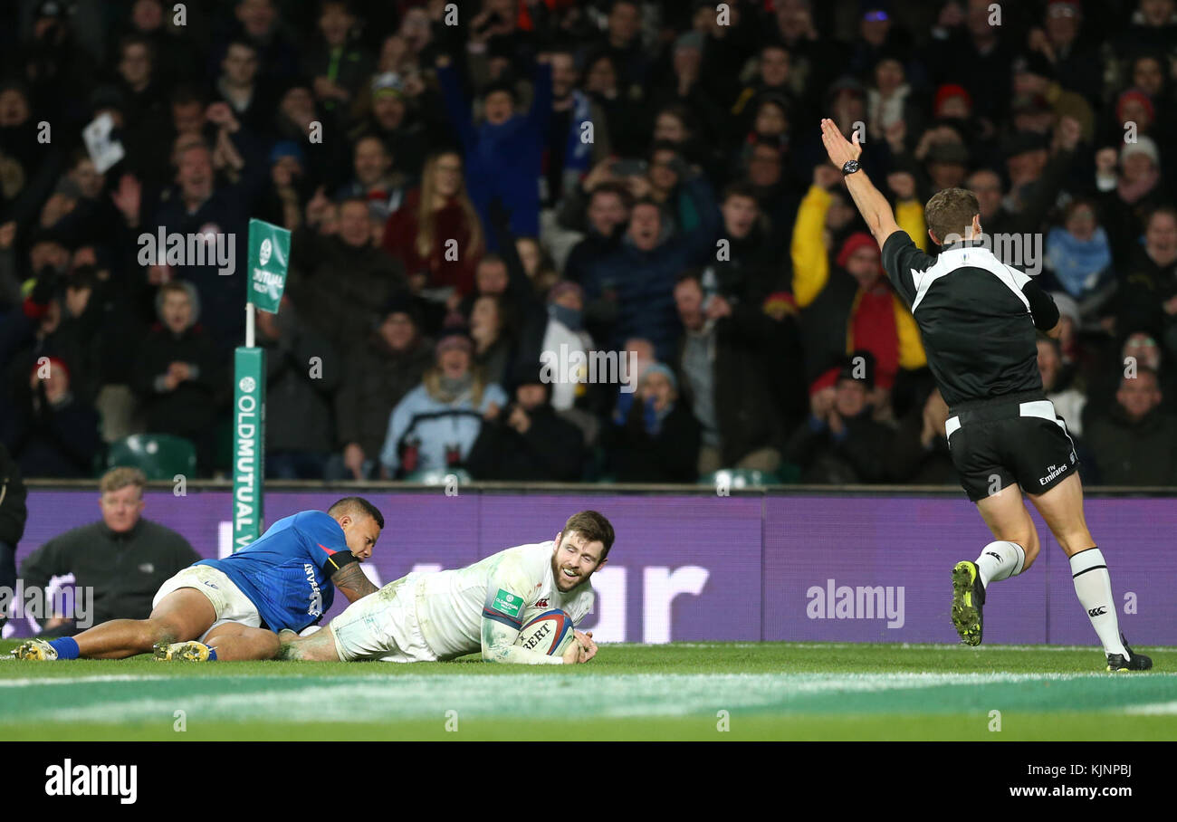 England's Elliot Daly goes over to scores his sides's fourth try of the ...