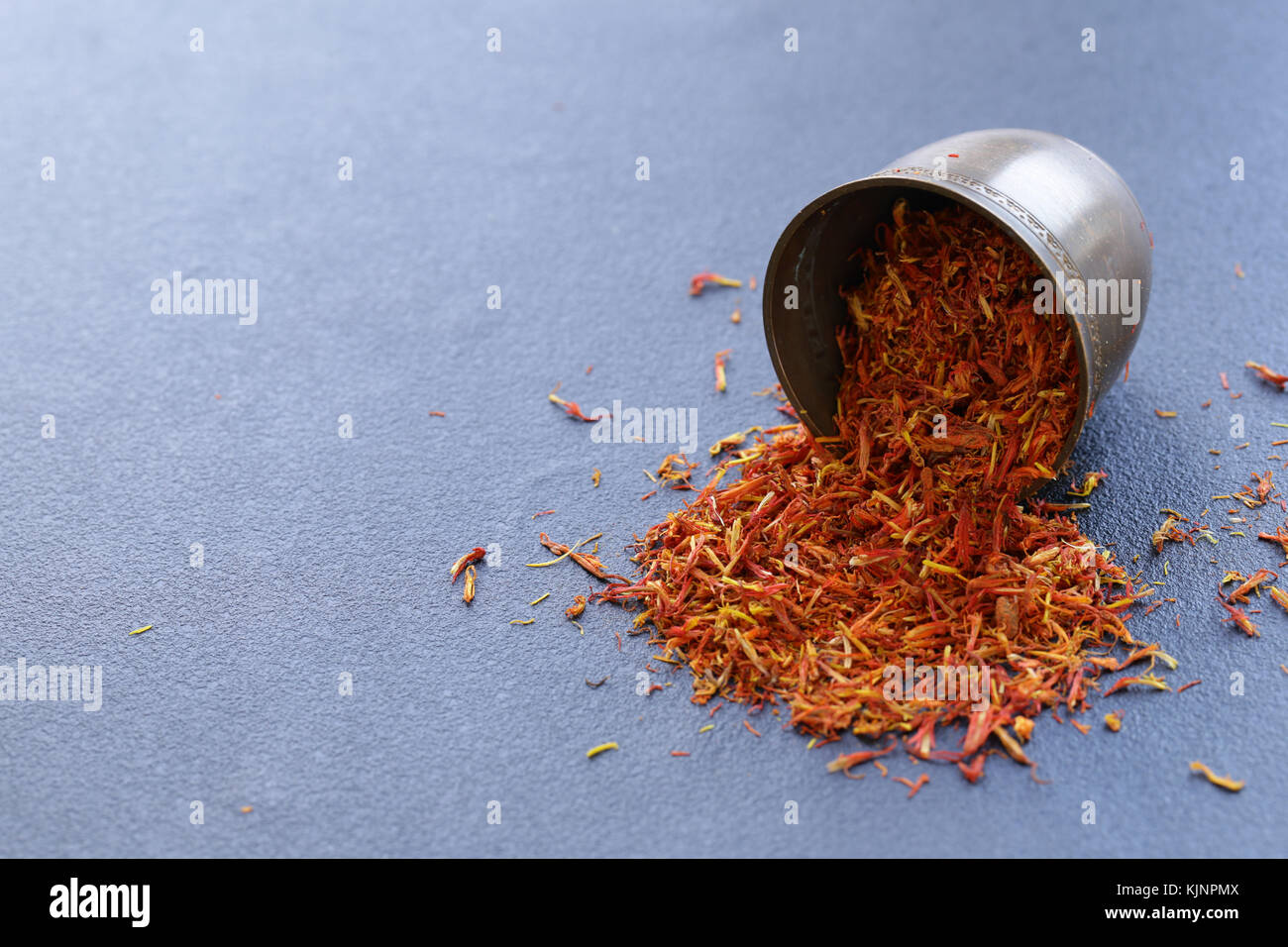 Traditional aromatic spice saffron in a mortar Stock Photo - Alamy