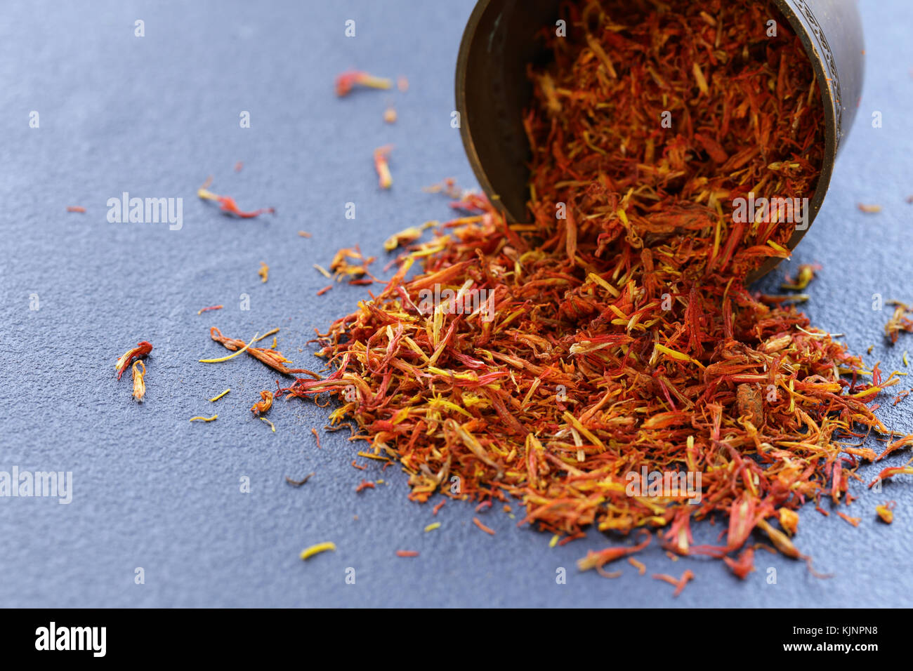 Traditional aromatic spice saffron in a mortar Stock Photo - Alamy