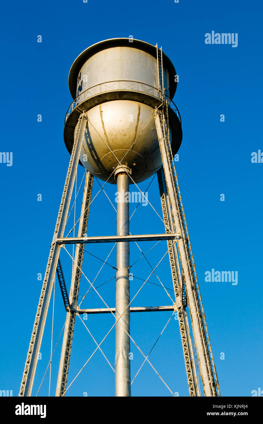 Low view of a tall water tower with bright blue sky background Stock ...