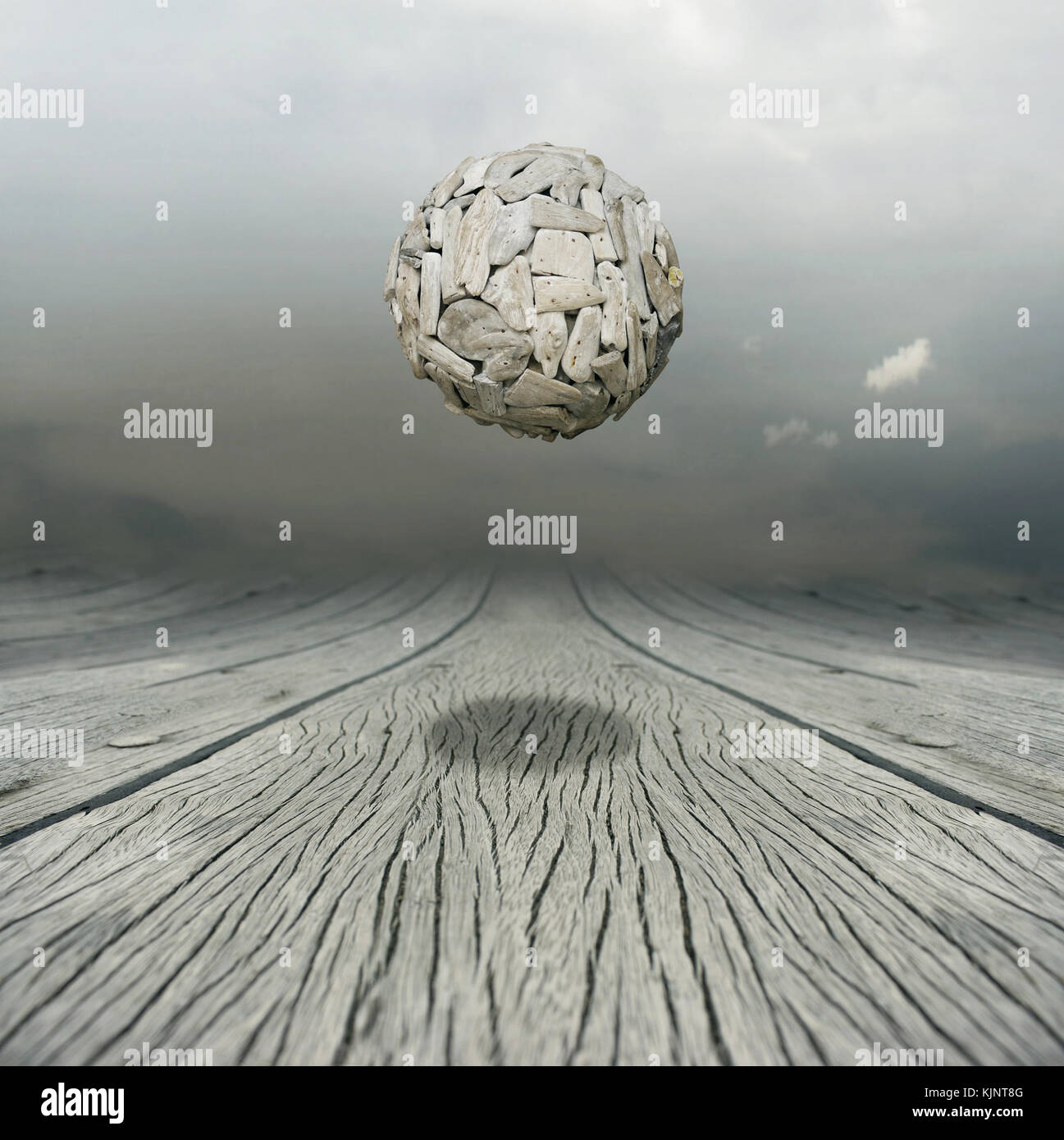 Artistic metaphysical background representing a ball sculpture floating ...