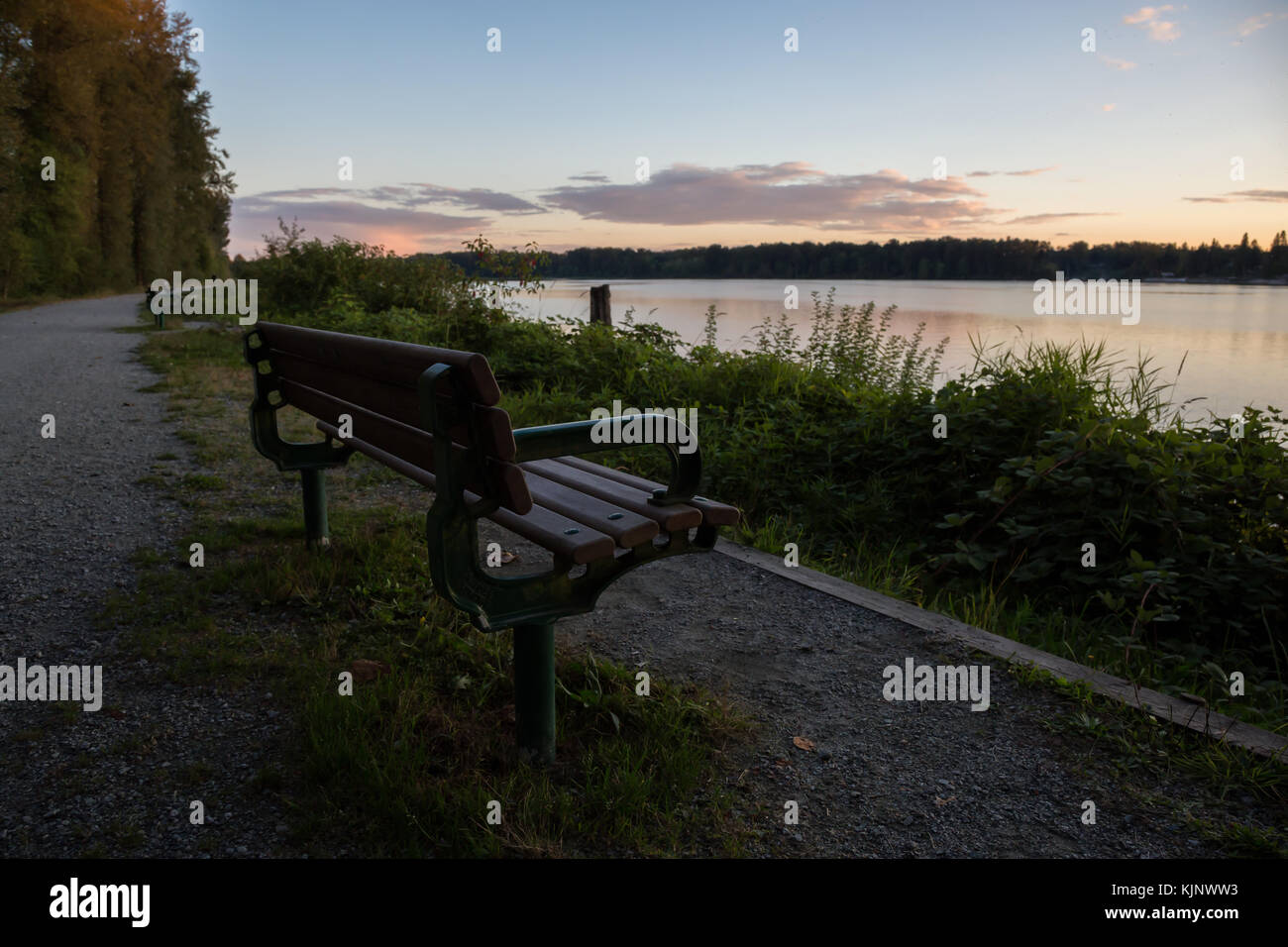 Sunset view of a bench at Kanaka Creek Regional Park, Maple Ridge ...