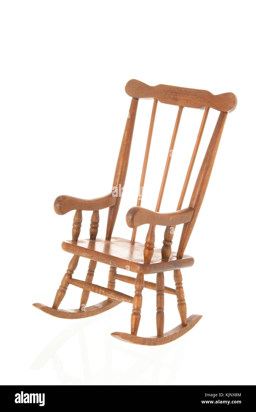 Wooden rocking chair isolated over white background Stock Photo - Alamy