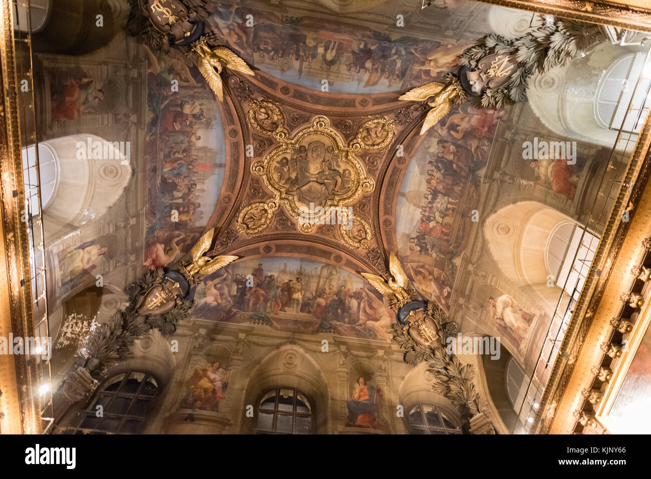 The intricately decorated ceiling inside Louvre museum in Paris Stock ...