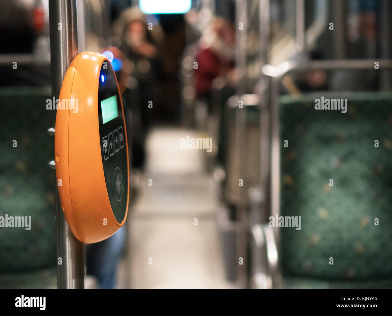 Ticket validation system on modern public transport Stock Photo - Alamy