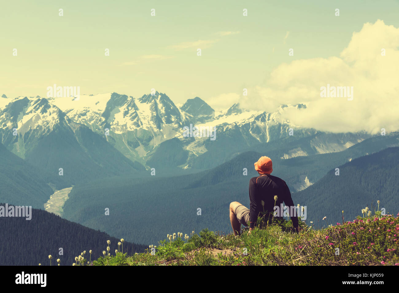 Backpacker in mountains Stock Photo - Alamy
