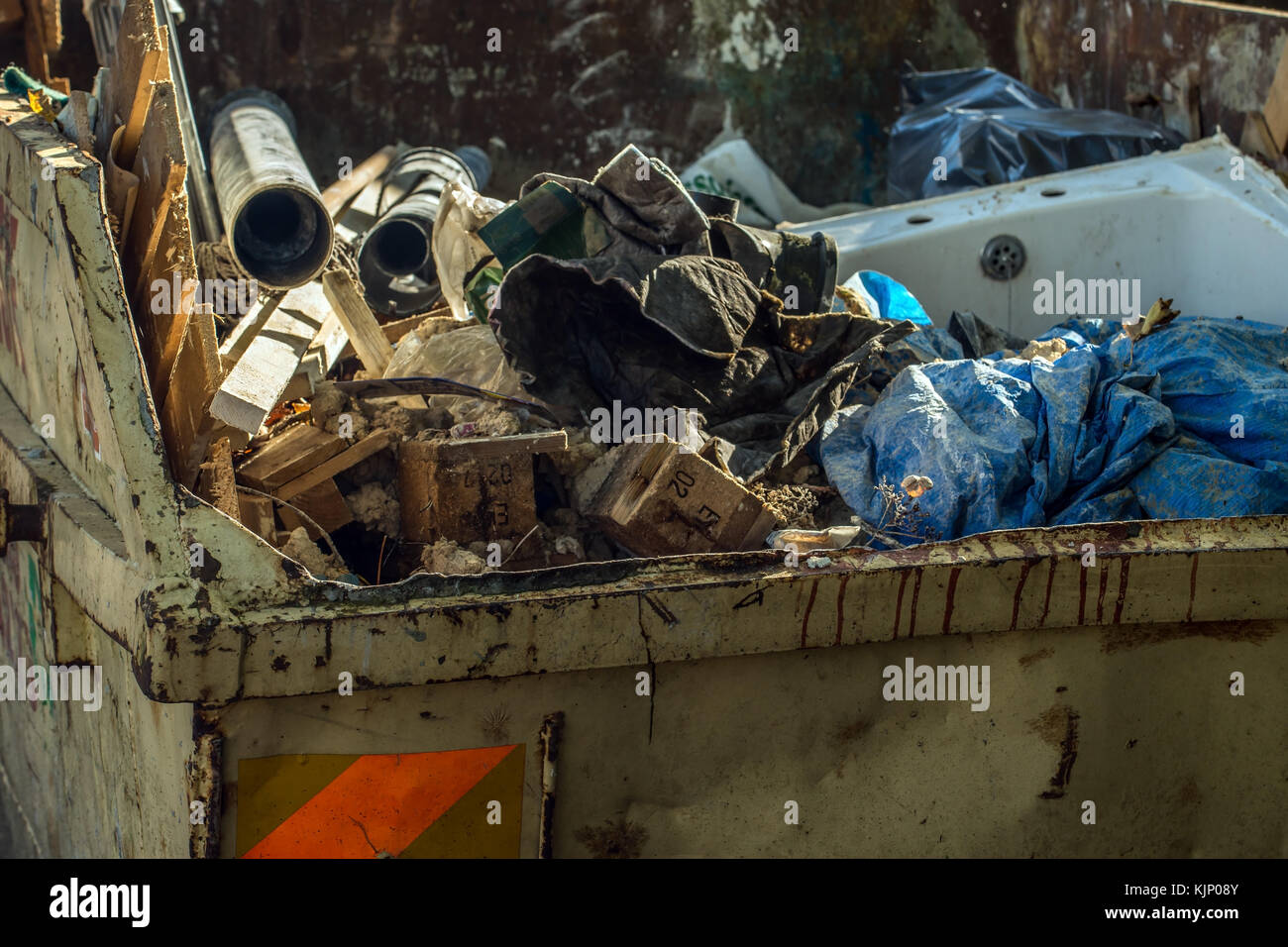 Rubbish in the skip Stock Photo - Alamy