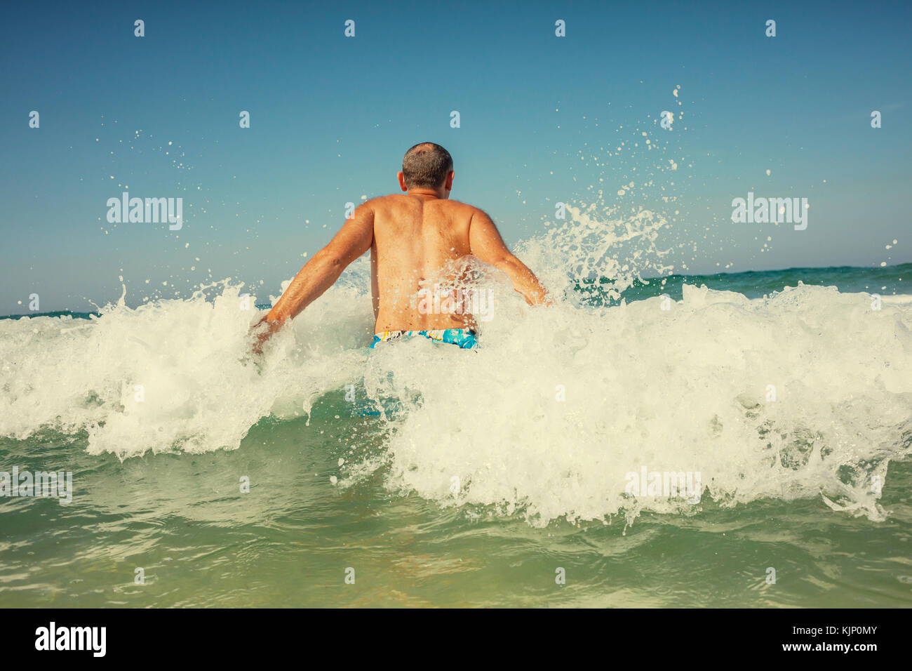 happy man in ocean Stock Photo - Alamy
