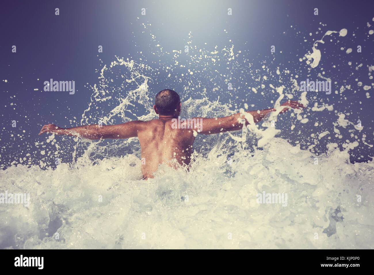 happy man in ocean Stock Photo - Alamy
