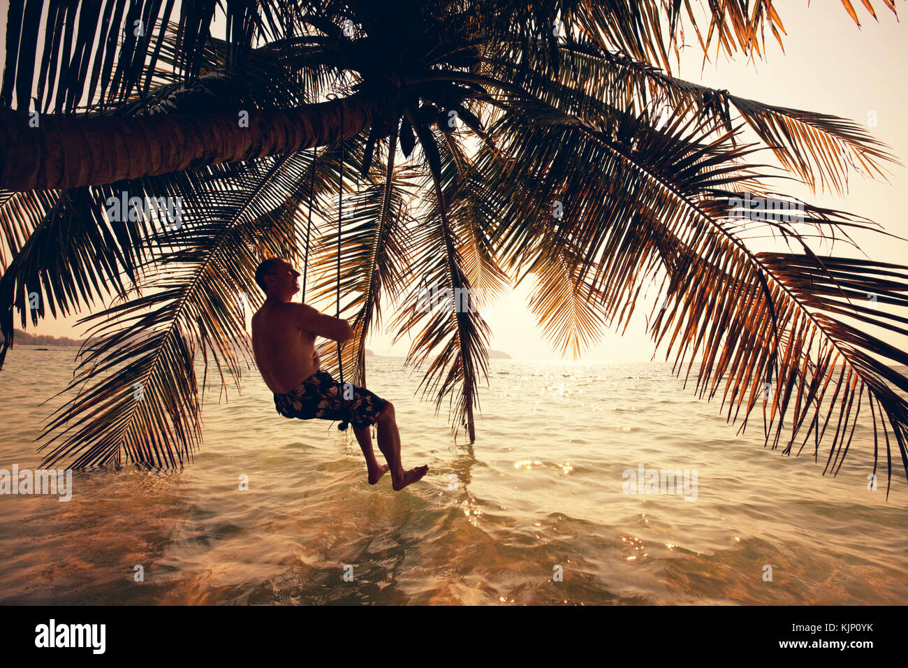 Man on beach Stock Photo - Alamy
