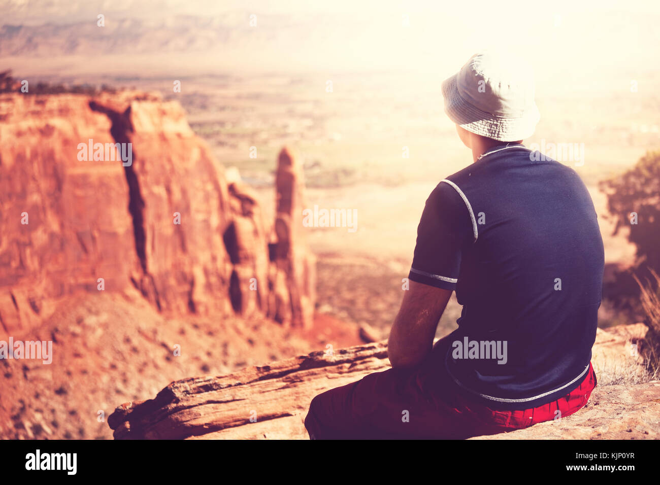 man on the cliff Stock Photo - Alamy