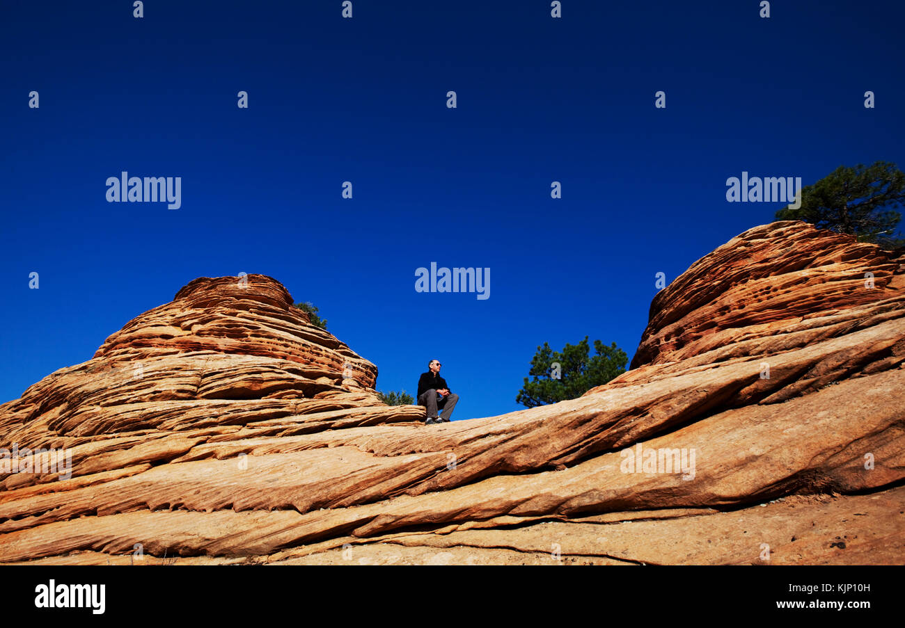 man on the cliff Stock Photo - Alamy