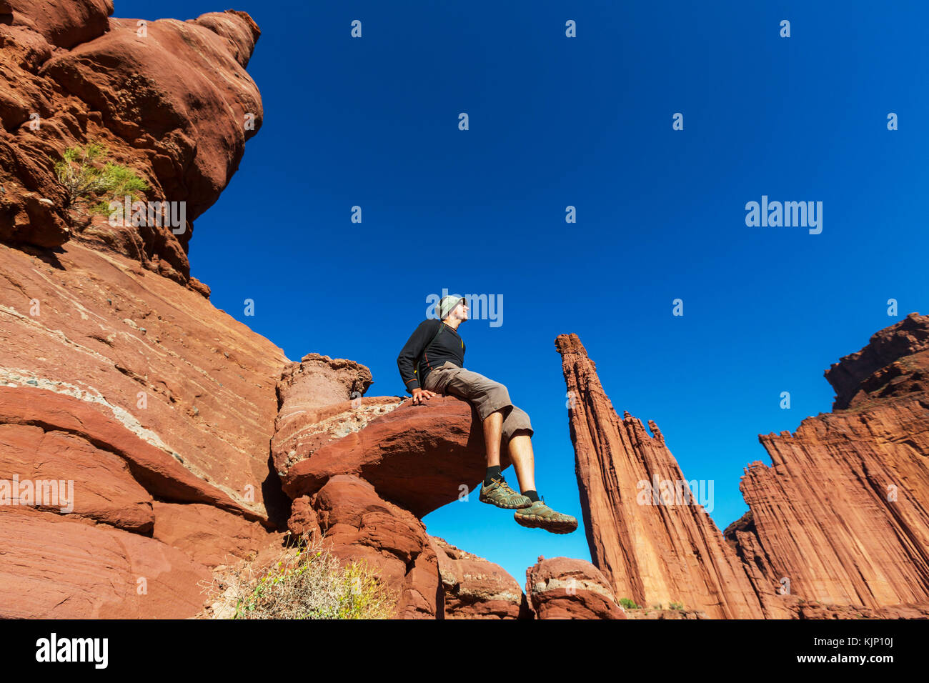 man on the cliff Stock Photo - Alamy