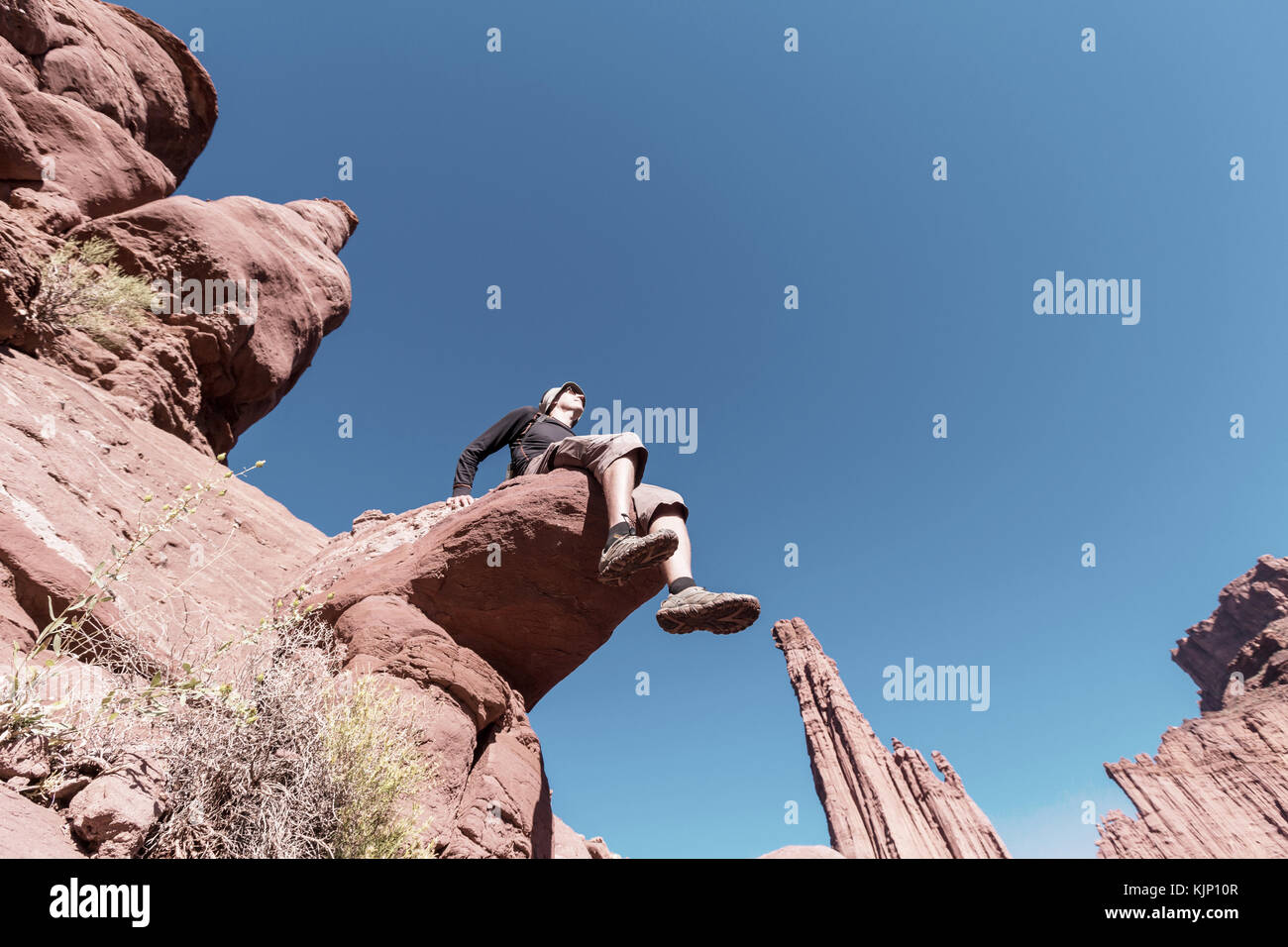 man on the cliff Stock Photo - Alamy