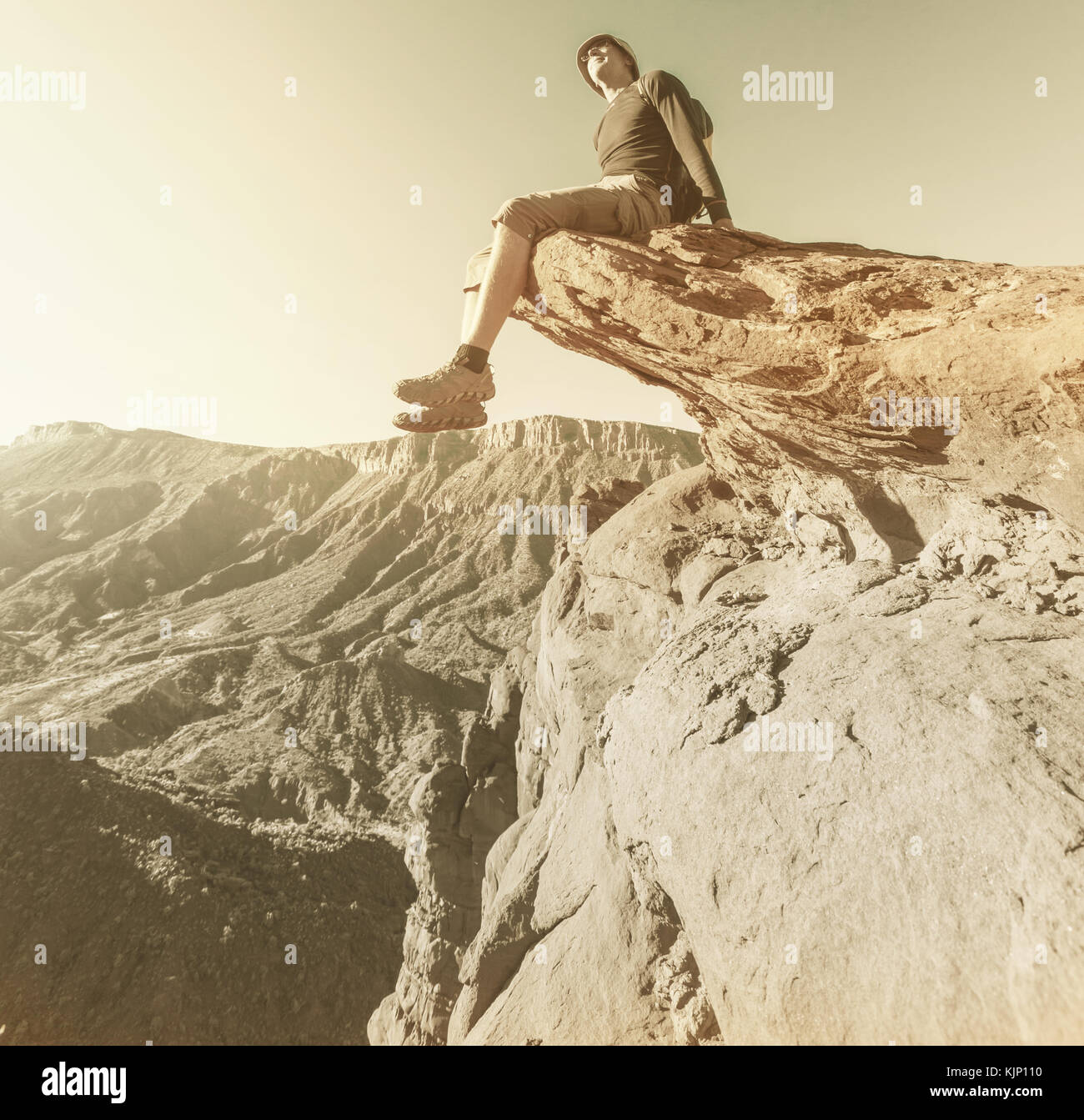 man on the cliff Stock Photo - Alamy