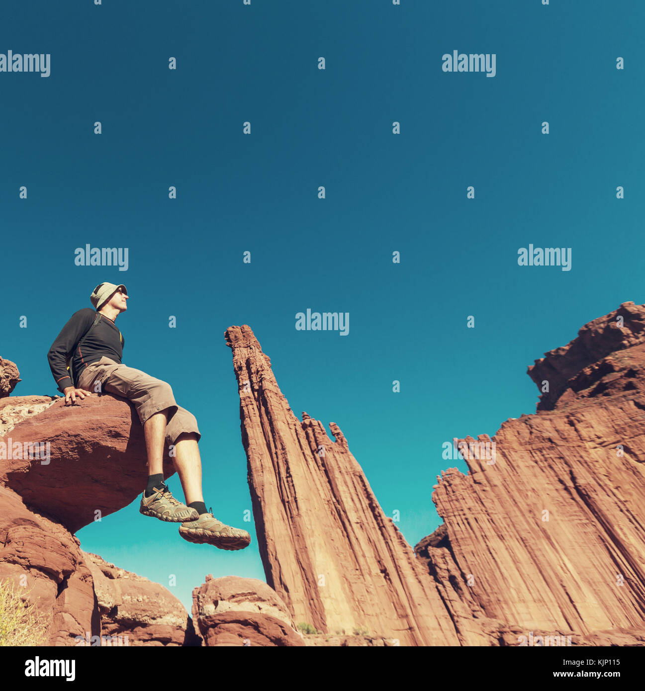 man on the cliff Stock Photo - Alamy