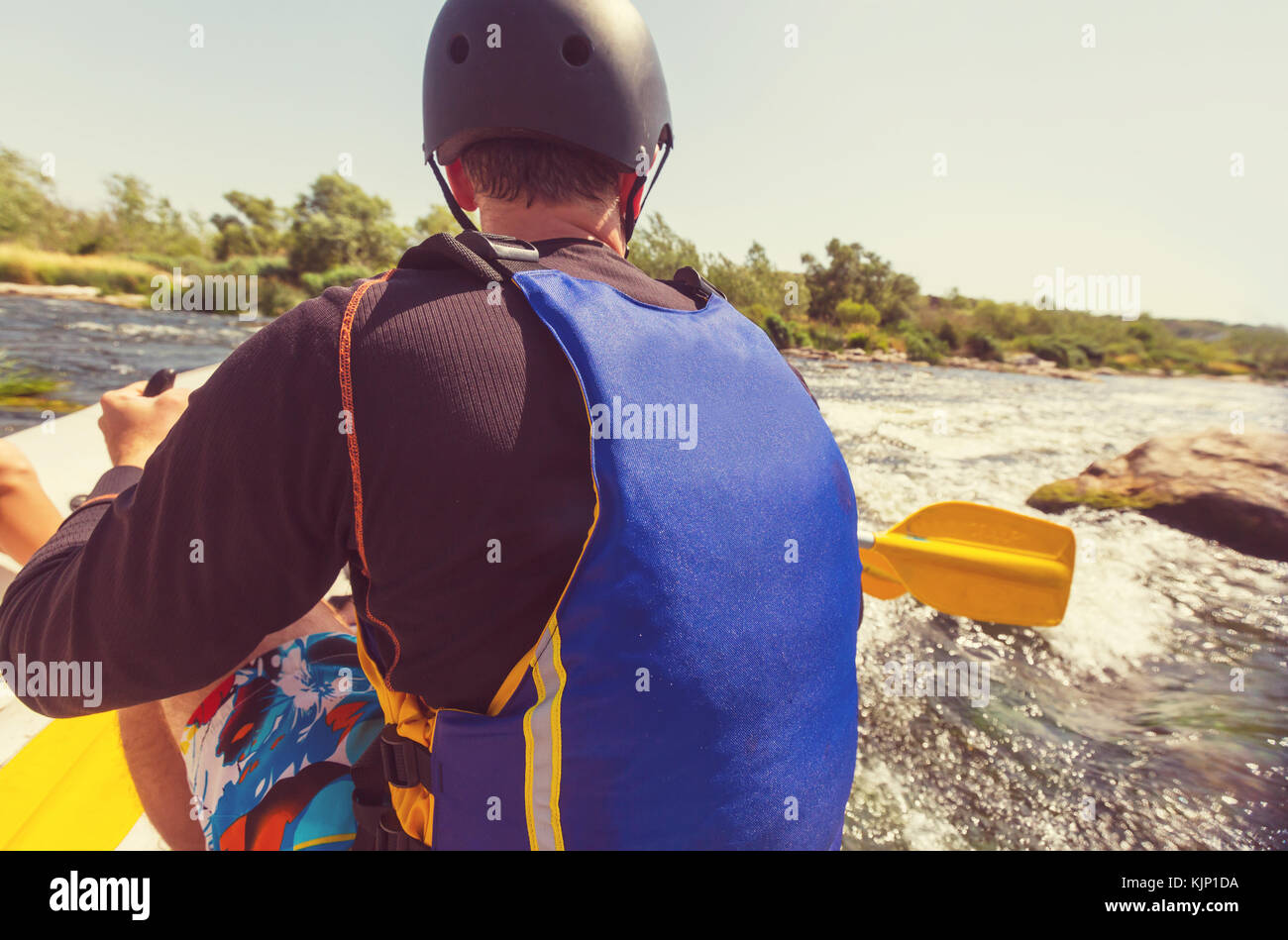 Rafting team , summer extreme water sport Stock Photo - Alamy