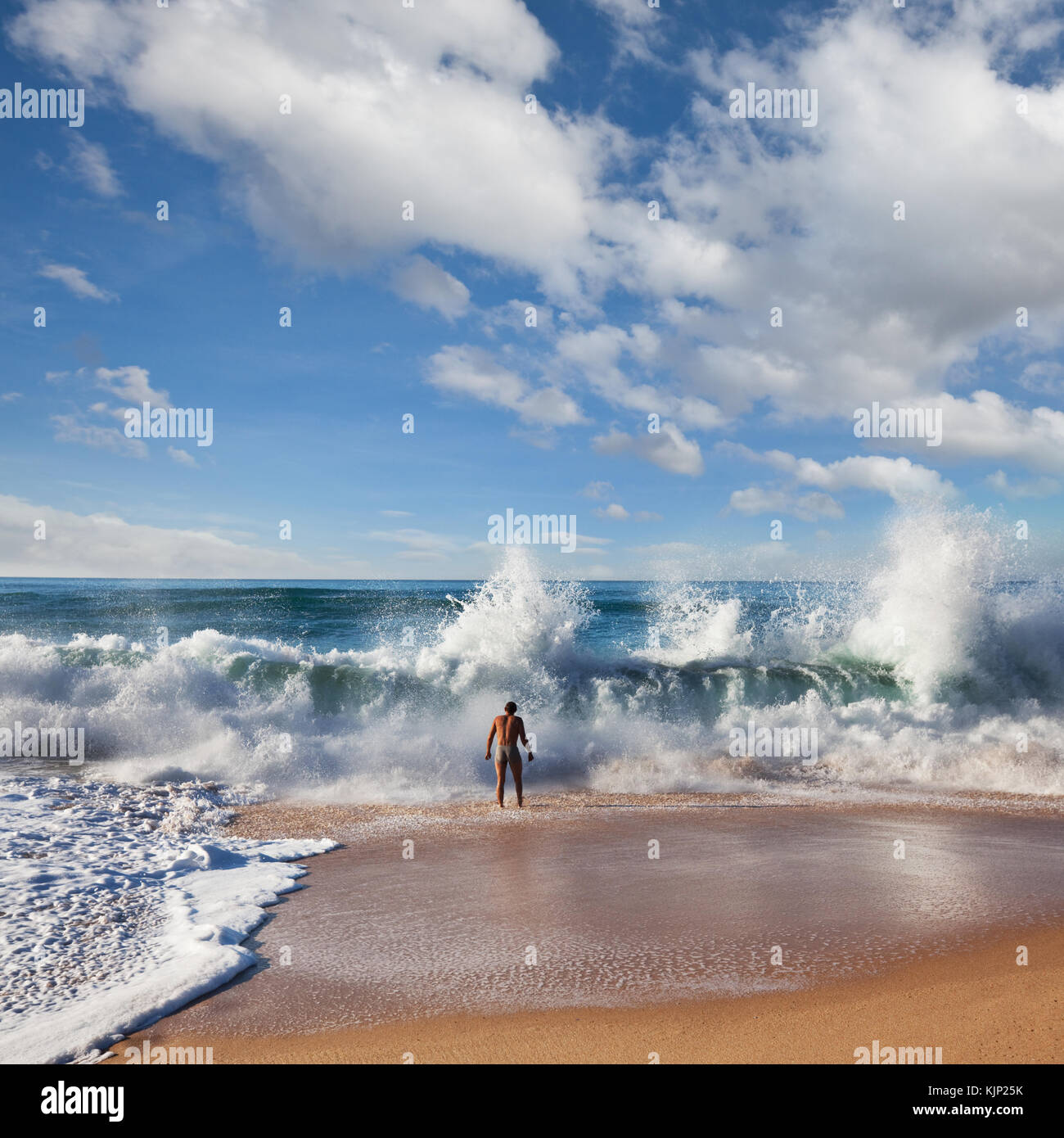 Wave on the beach Stock Photo - Alamy