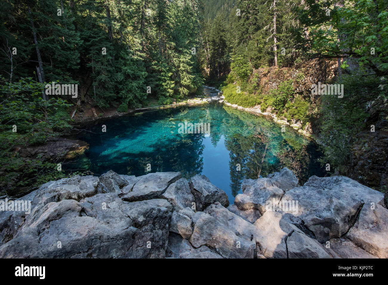Blue Pool From The Dry Waterfall Above on calm summer morning Stock ...