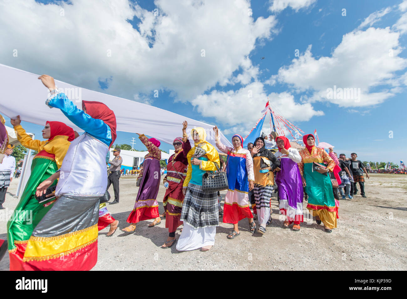 Buton women parade and perform dance with colourful traditional ...
