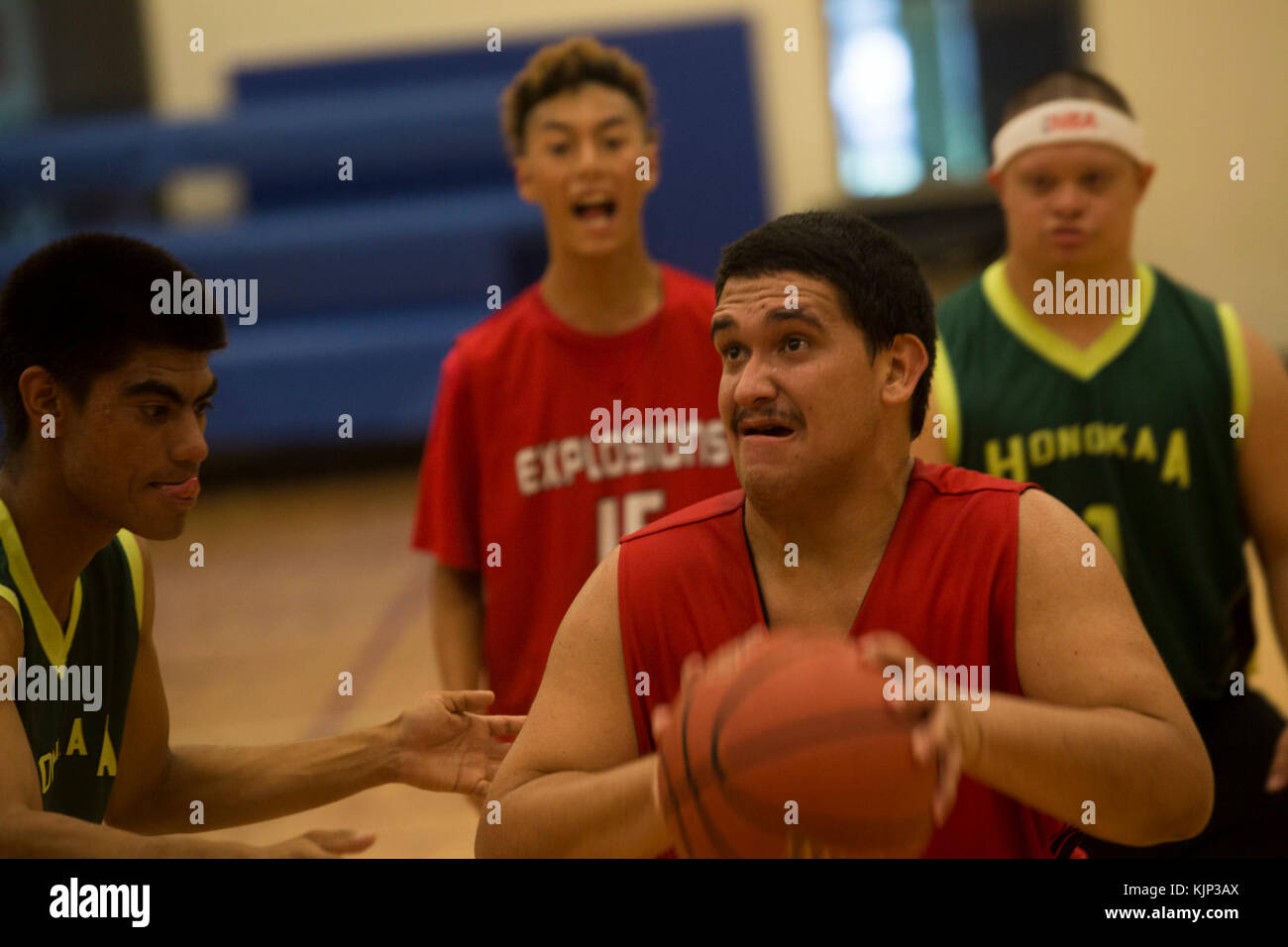 Tyler Tim Sing, number 11 on the Explosion- Kanelehua, attempts a layup ...