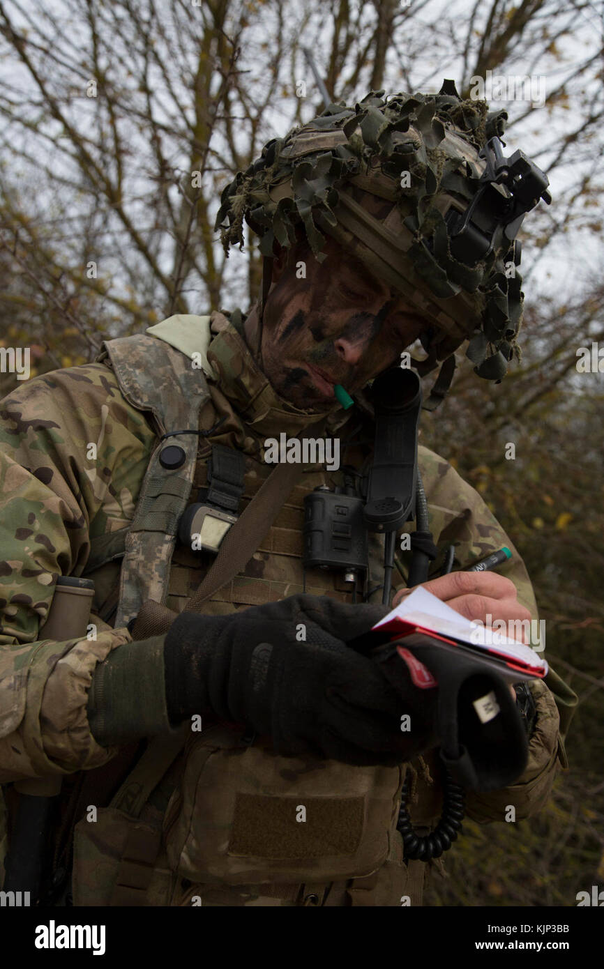 A Dutch soldier writes notes during exercise Allied Spirit VII at the U ...