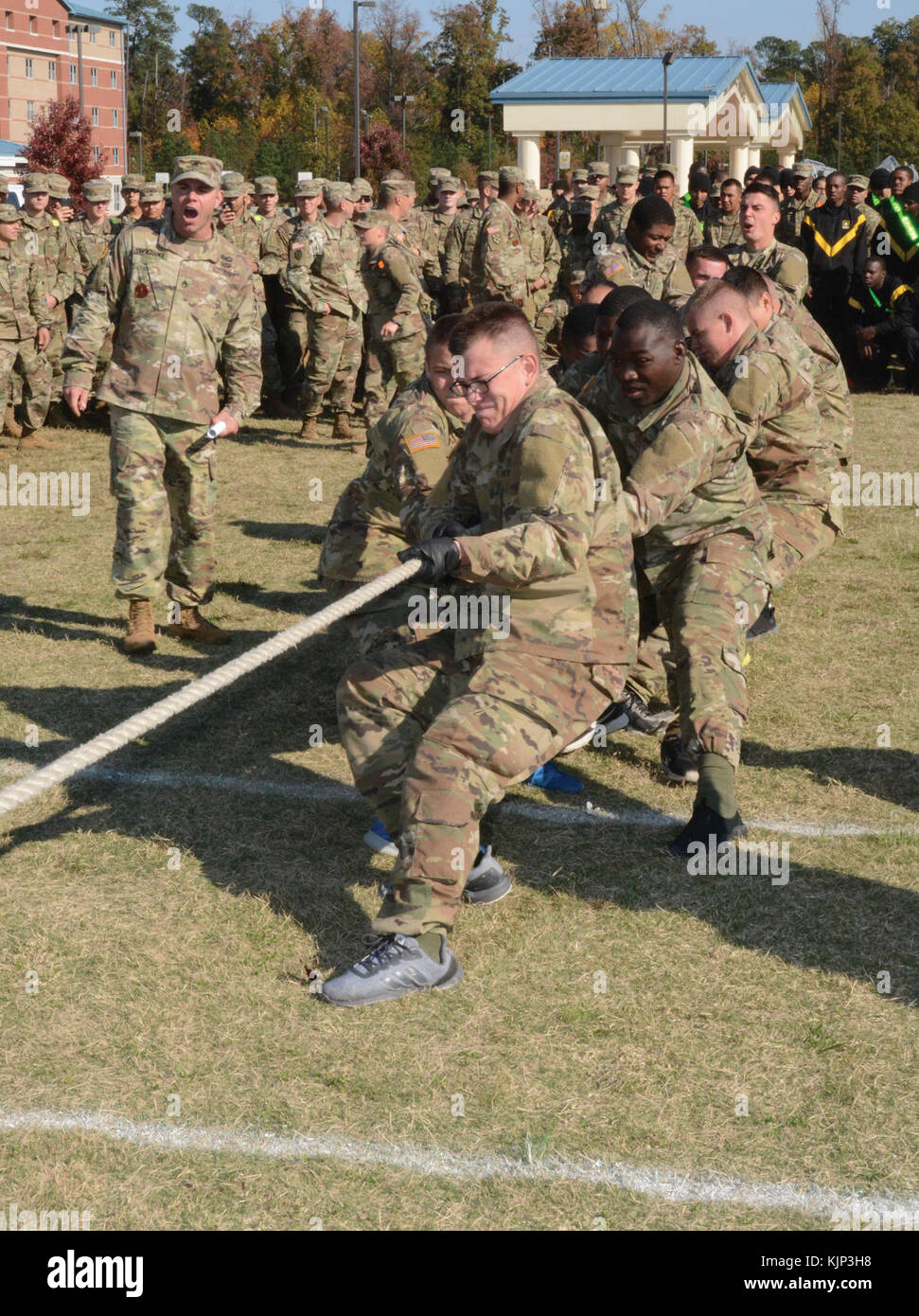 With shouts of encouragement from Staff Sgt. Brandon Delagrange, an AIT ...
