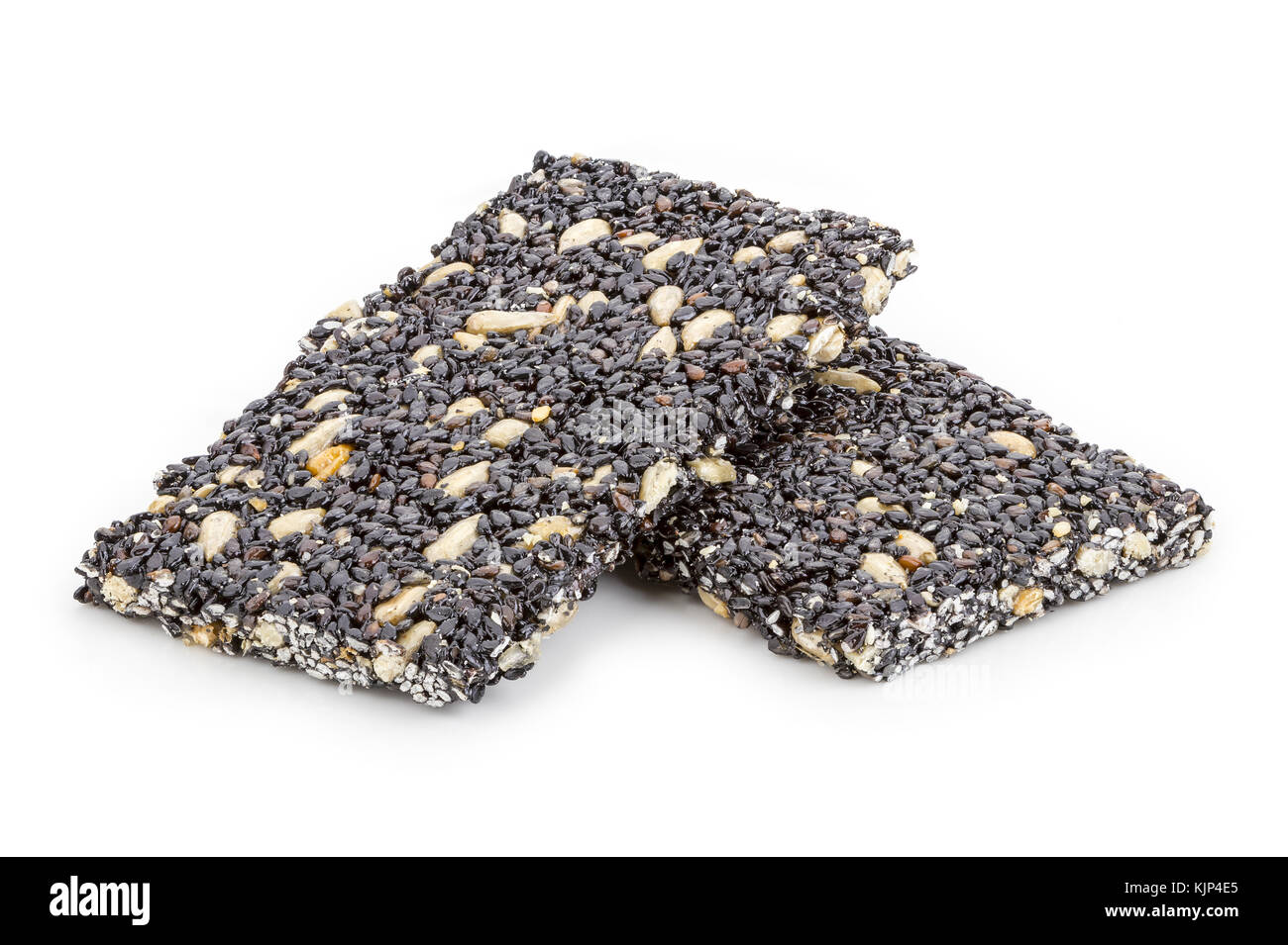 Granola bar (balack sesame bar) on white background Stock Photo - Alamy