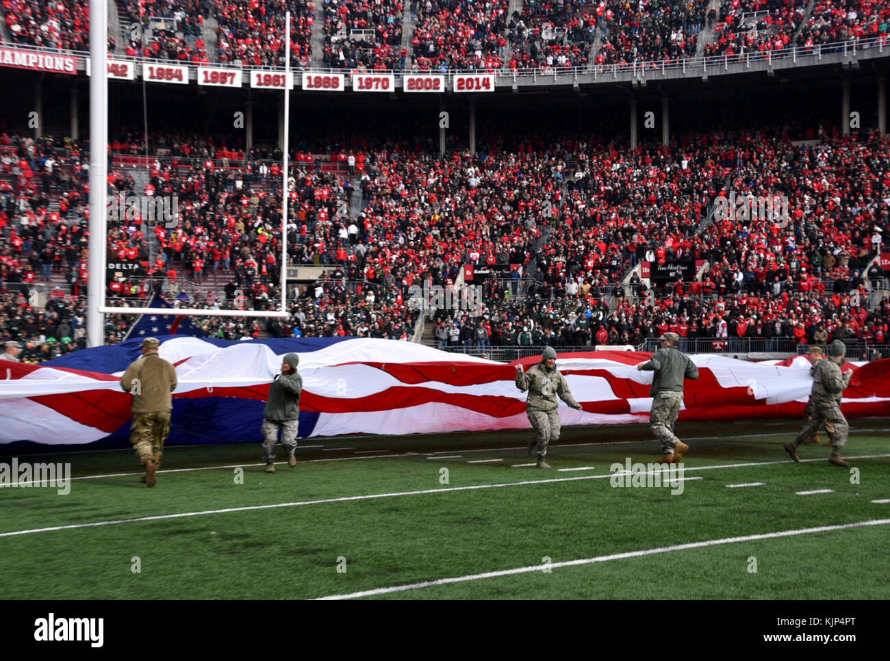 Members of Ohio Army and Air Force National Guard units present the ...