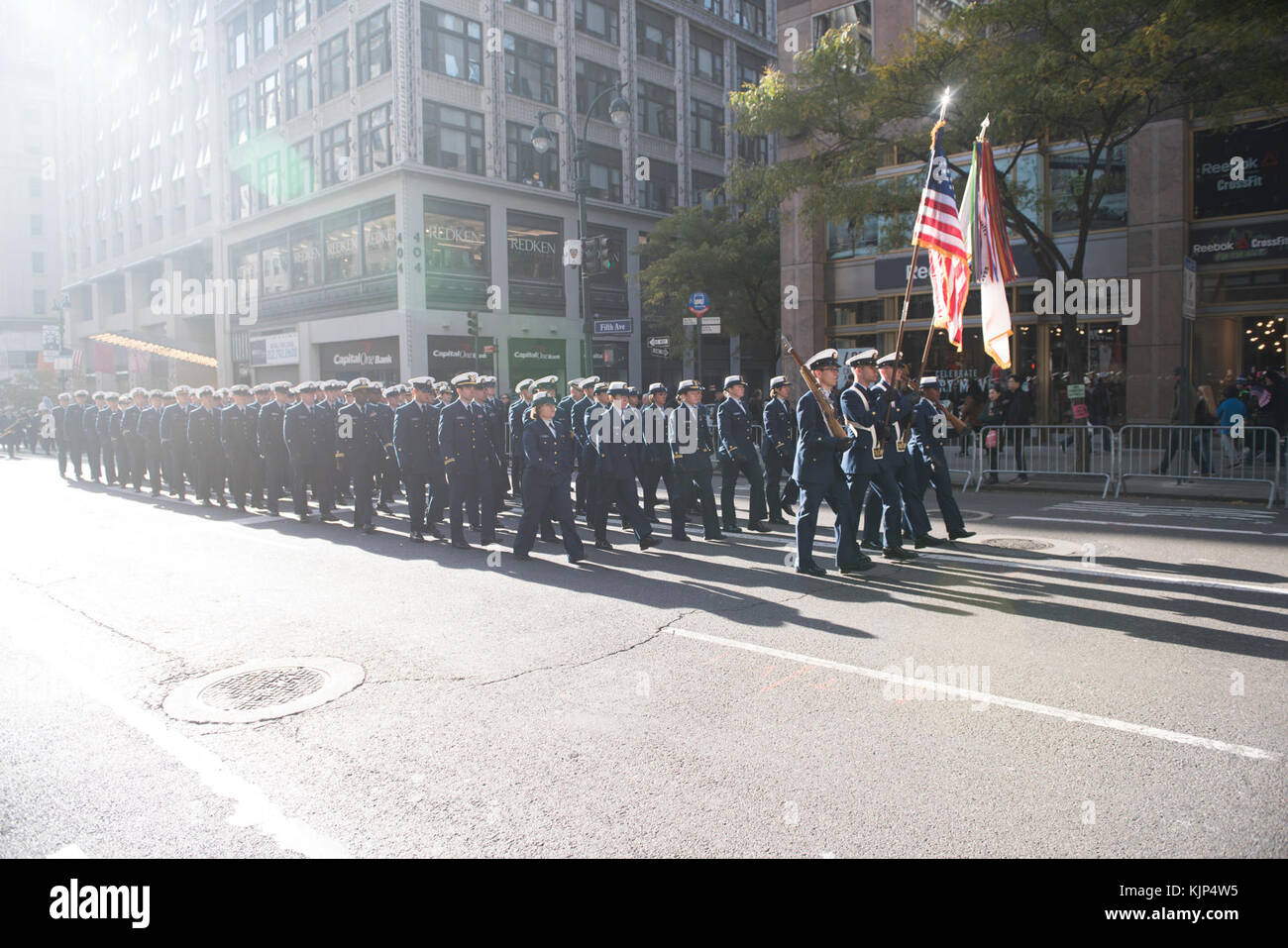 Coast Guard Sector New York members represent the unit while marching ...