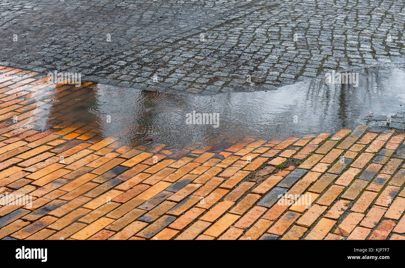Pavement puddle hi-res stock photography and images - Alamy
