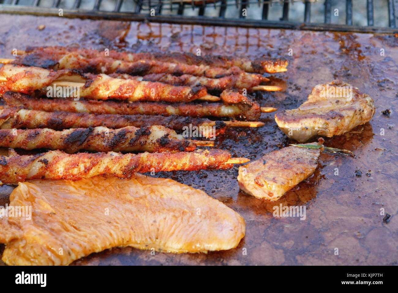 BBQ ribs on open griddle with close up Stock Photo - Alamy