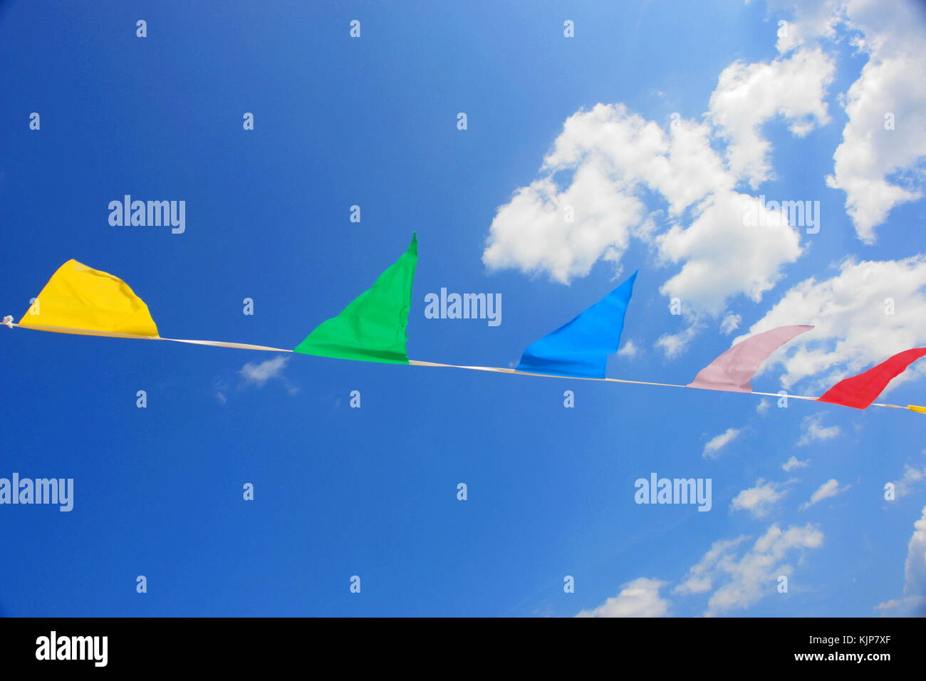 Multi Colored Triangular Flags Hanging in the Sky at an Outdoor ...