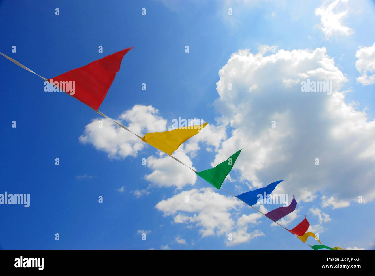 Multi Colored Triangular Flags Hanging in the Sky at an Outdoor ...