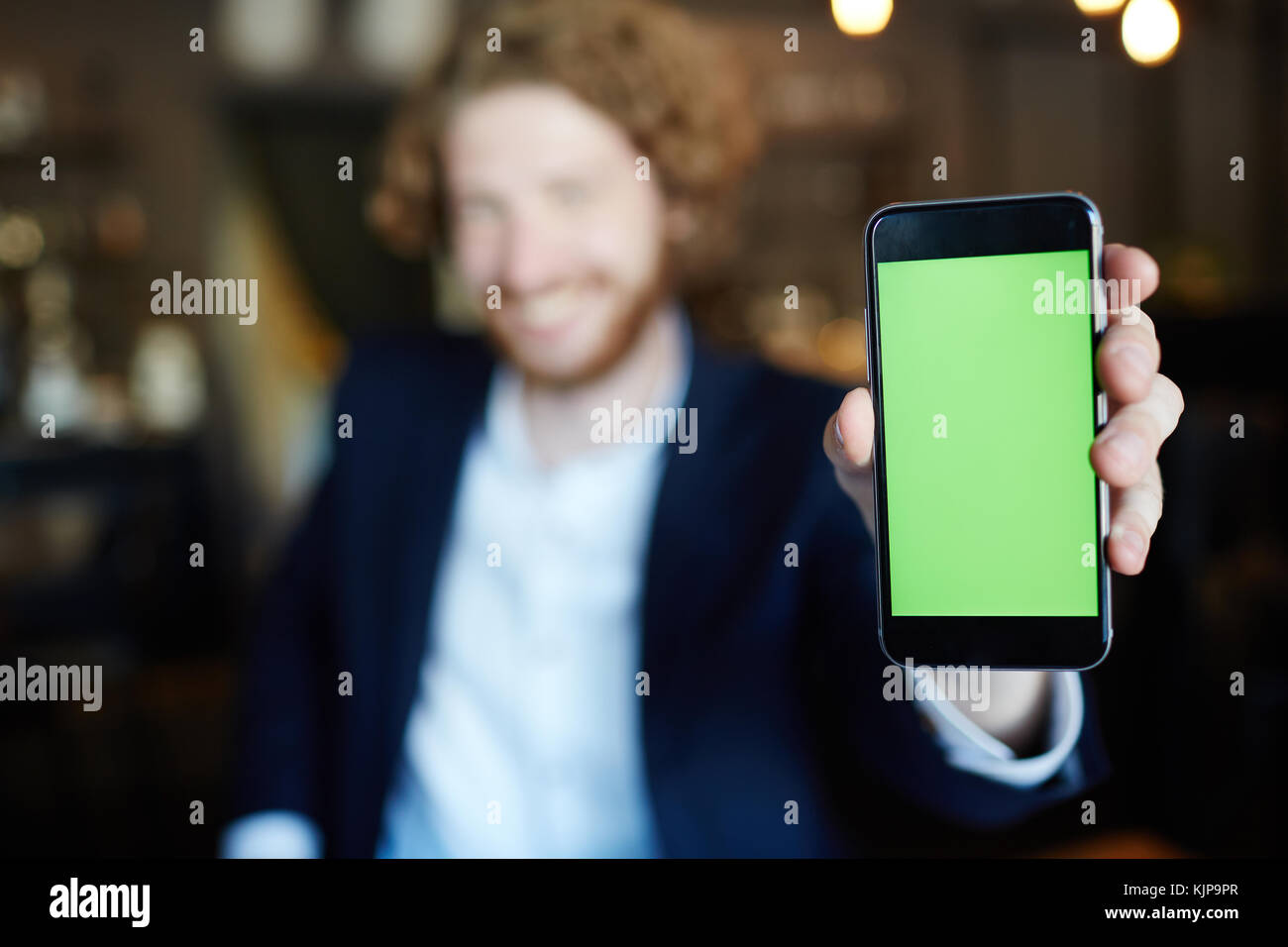 Smartphone with curious information on its display in human hand Stock ...