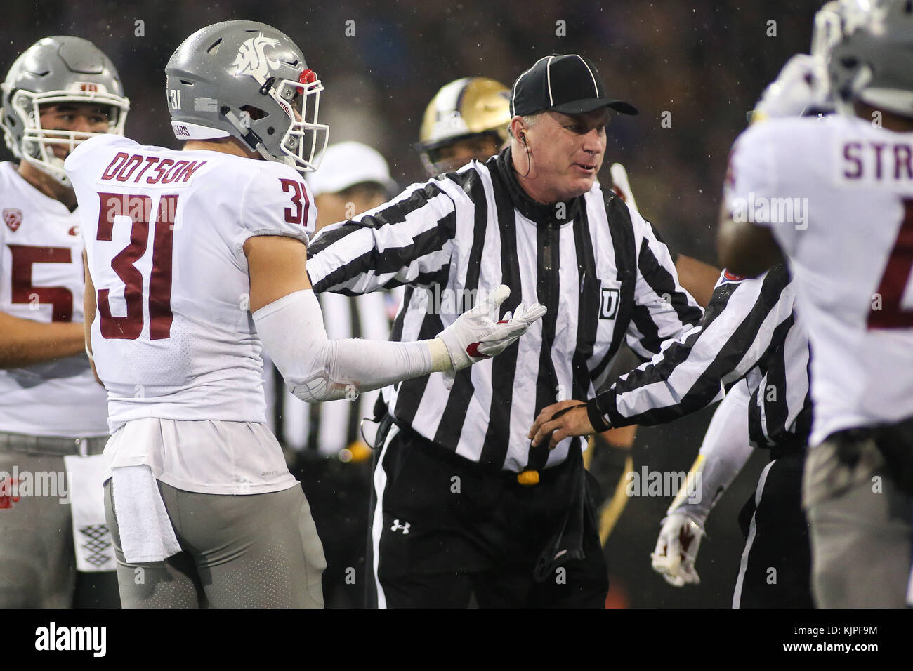 November 25, 2017: Umpire Rick DiBernardo pushes Washington State ...