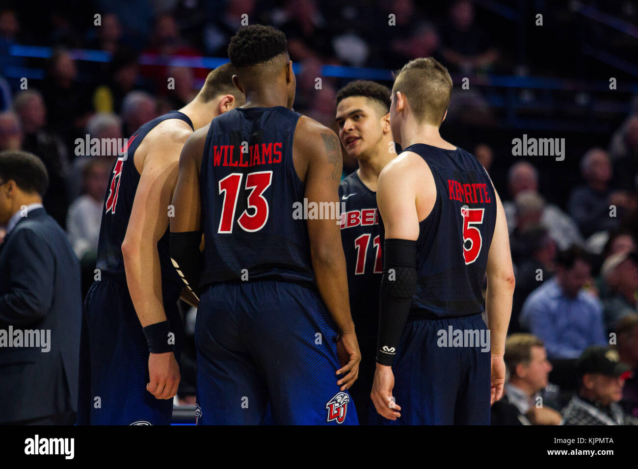 Winston-Salem, NC, USA. 14th Nov, 2017. Liberty players huddle during a ...